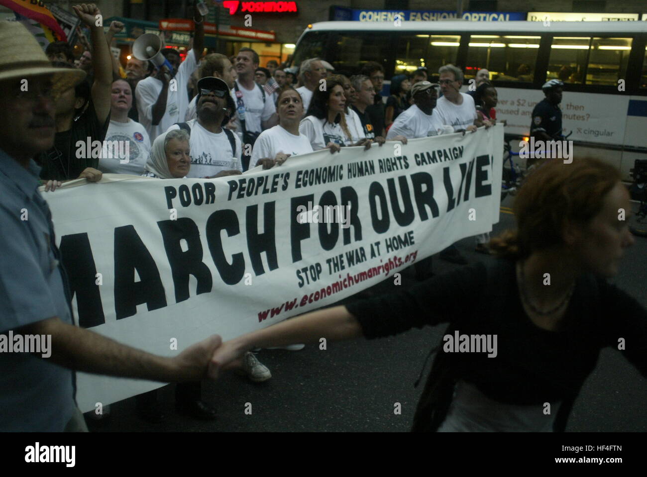 Protesters march against George W. Bush, the Republican administration ...
