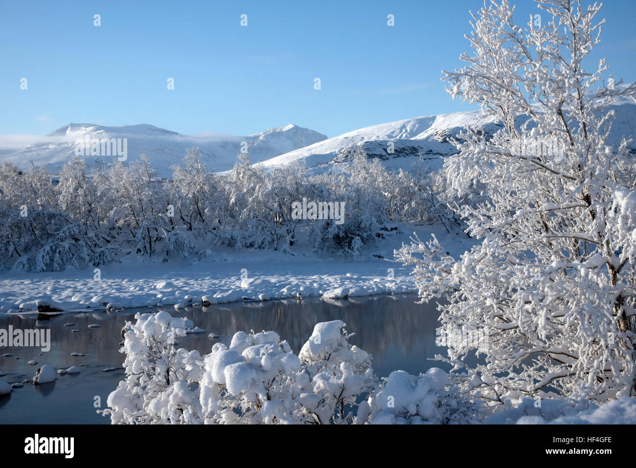 Winter scene with mountains and river in Jotunheimen National Park ...