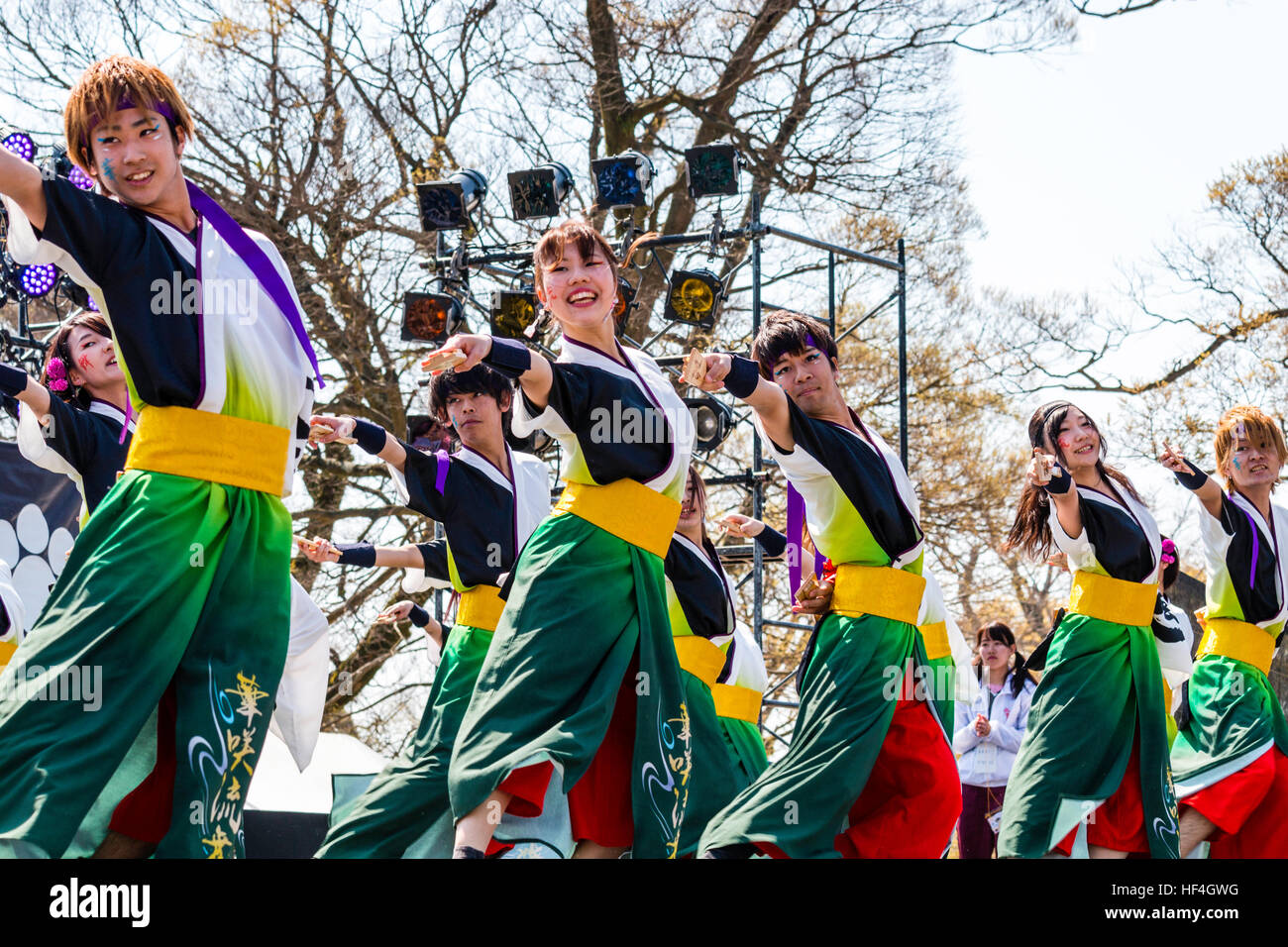 Japanese yosakoi dance festival. Men and women team dancing on stage in ...