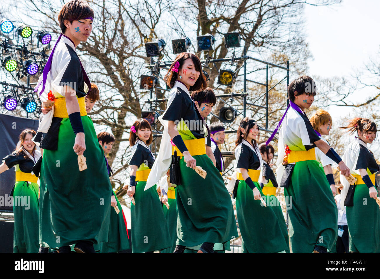Japanese yosakoi dance festival. Men and women team dancing on stage in ...