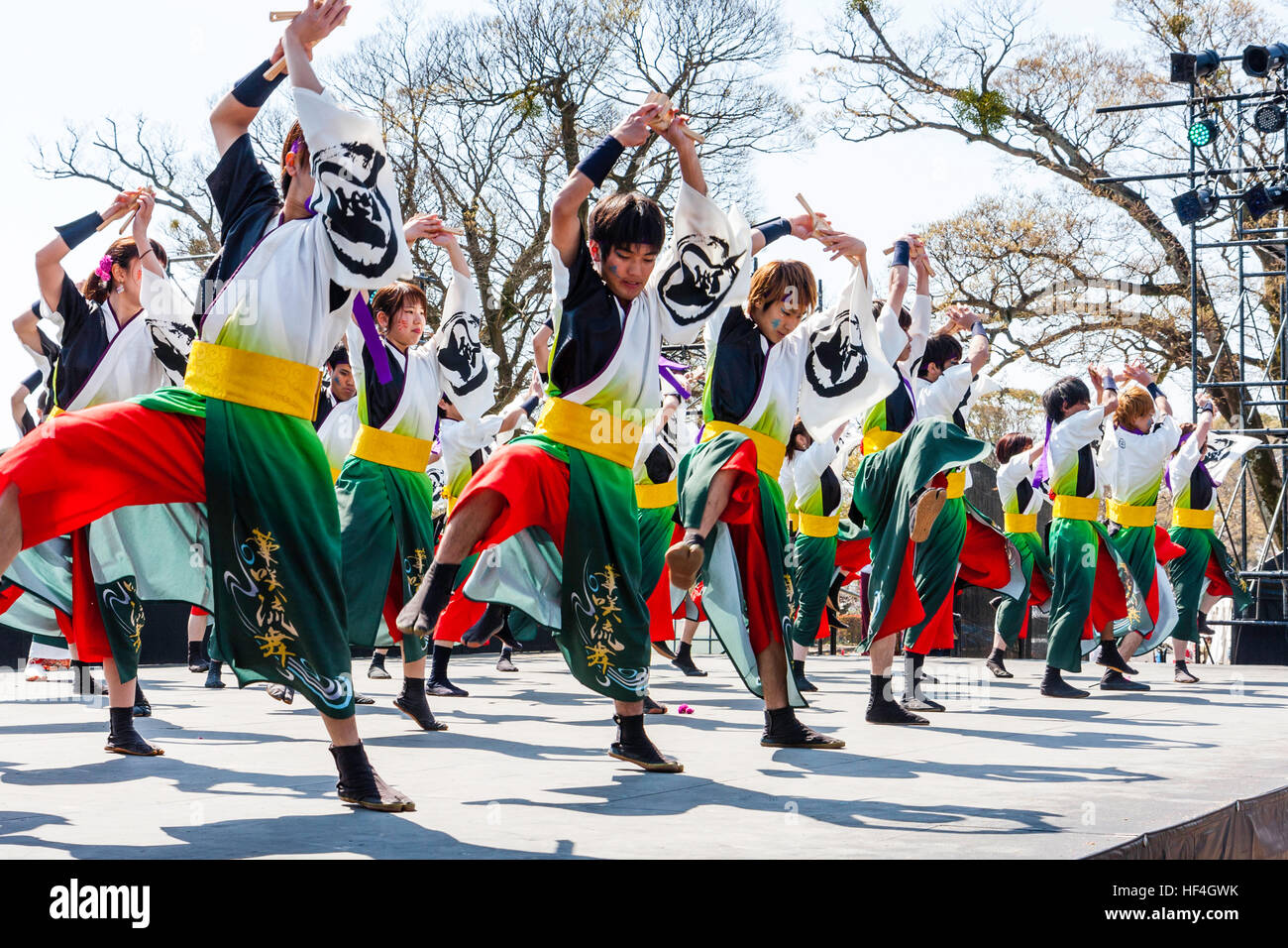 Japanese yosakoi dance festival. Men and women team dancing on stage in ...