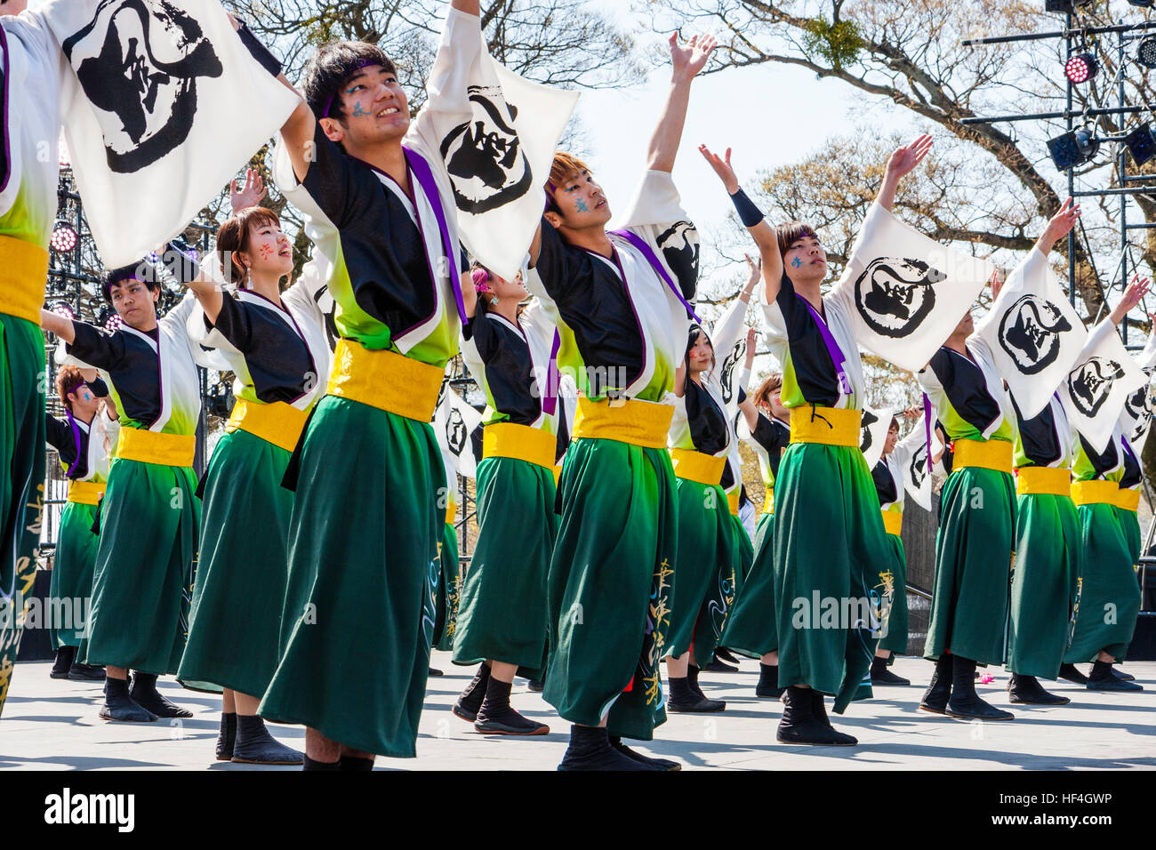 Japanese yosakoi dance festival. Men and women team dancing on stage in ...