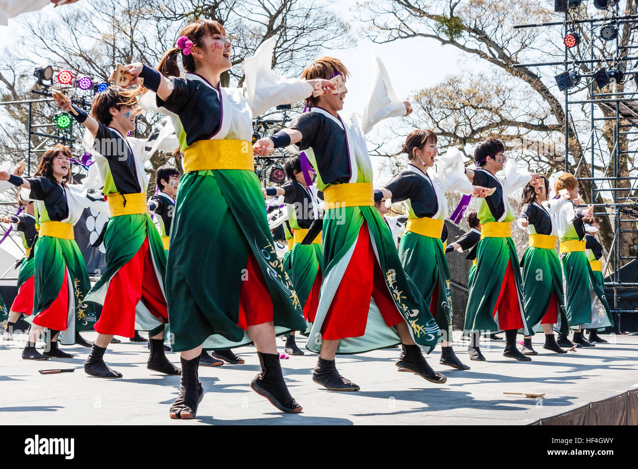 Japanese yosakoi dance festival. Men and women team dancing on stage in ...