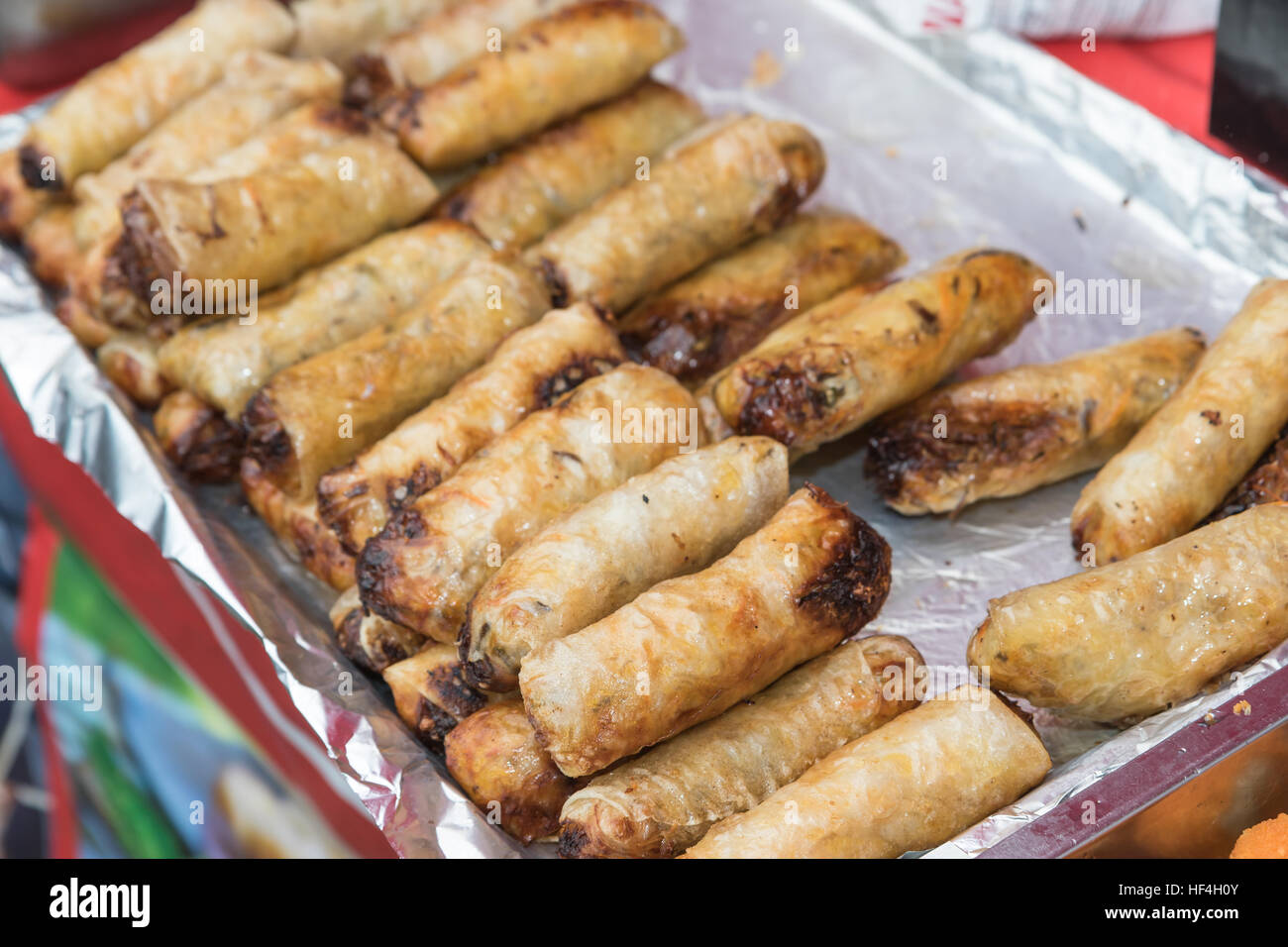 Street food - spring rolls ready for sale at the market Stock Photo - Alamy