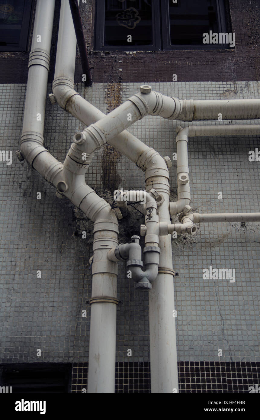 Old grunge building structure with pipes. Urban background Stock Photo ...