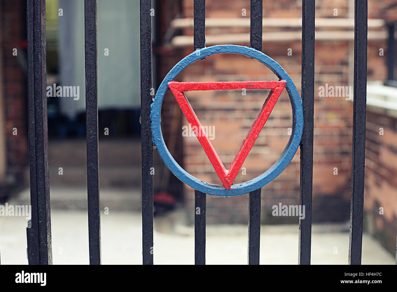 Old grunge building structure with metal fence. Urban background Stock ...