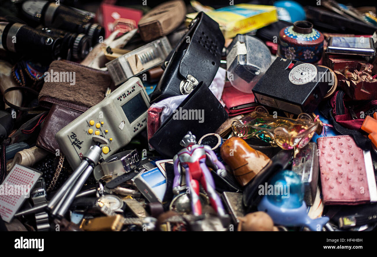 Dump of old things, different stuff. Chinese souvenirs Stock Photo - Alamy