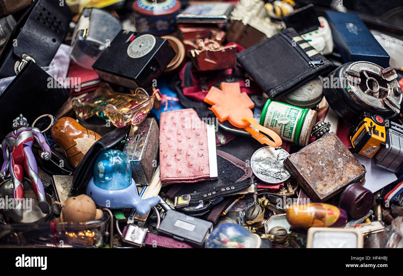 Dump of old things, different stuff. Chinese souvenirs Stock Photo - Alamy