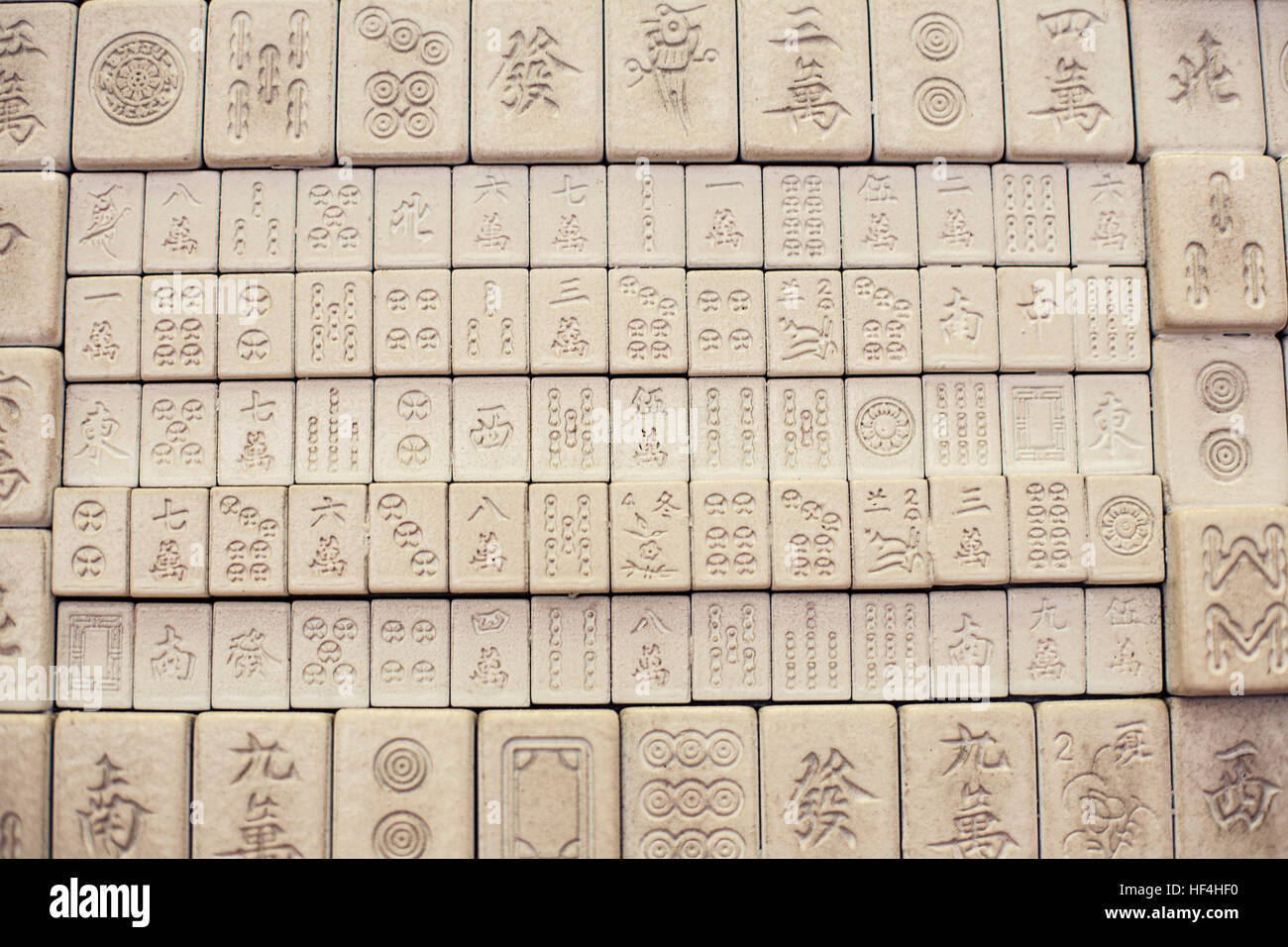 Wall of chinese characters on bricks. White background Stock Photo - Alamy