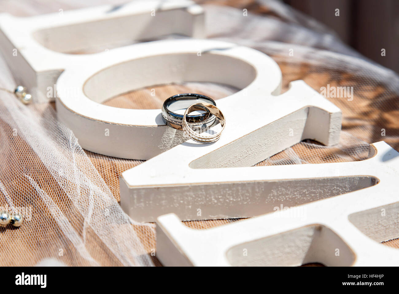 closeup of wedding rings with beautiful decoration Stock Photo - Alamy