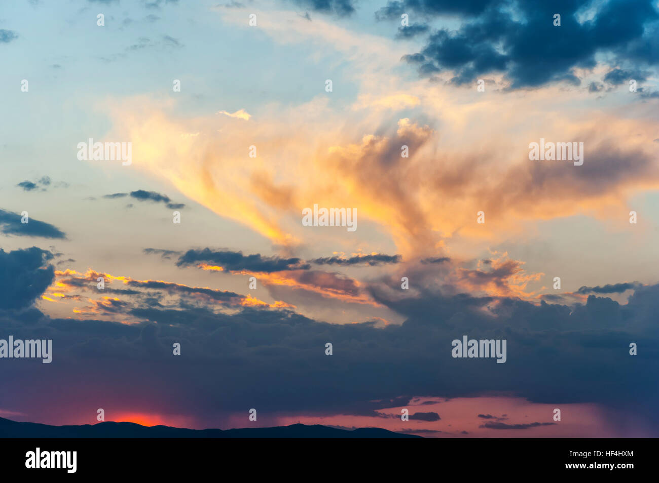 beautiful colors of the clouds at late afternoon Stock Photo - Alamy