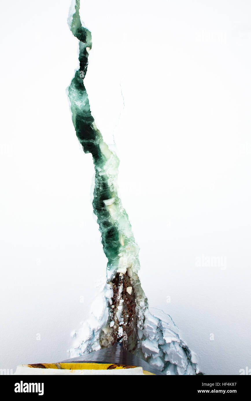 The ship National Geographic Explorer breaks through sizeable chunks of ...