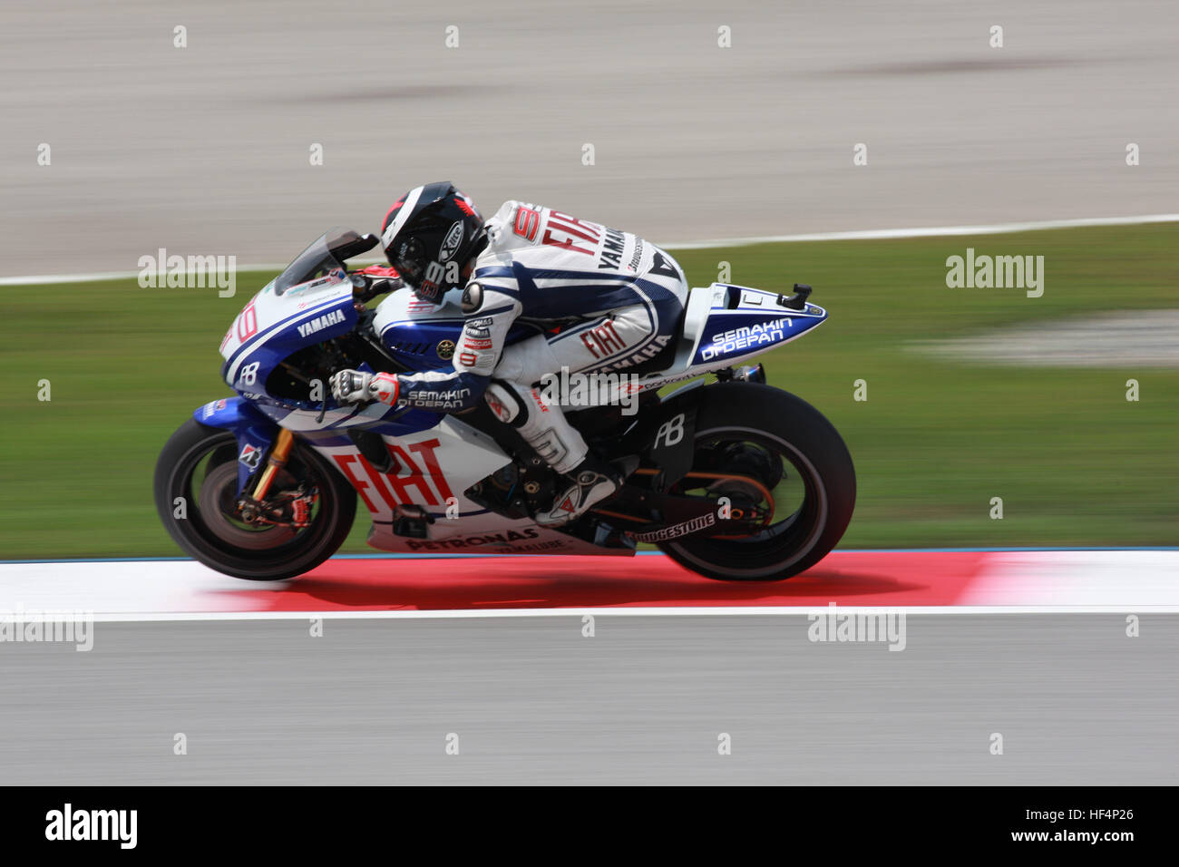 Moto GP rider during the race in Sepang International Circuits Stock ...