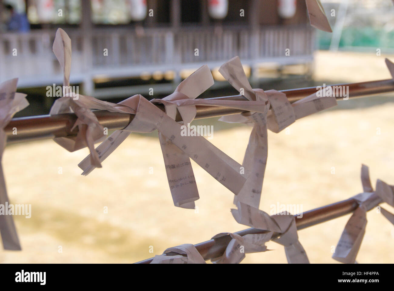 Prayer sheets wrapped around a metal rod at the Itsukushima Shrine on ...