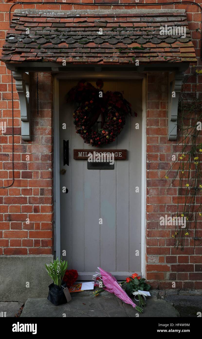 Floral tributes are left outside the Goring house of George Michael in ...