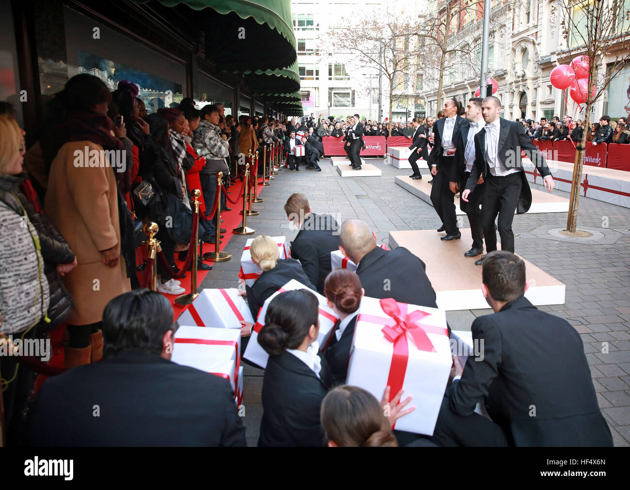 EDITORIAL USE ONLY Harrods butlers serve up a surprise at the opening ...