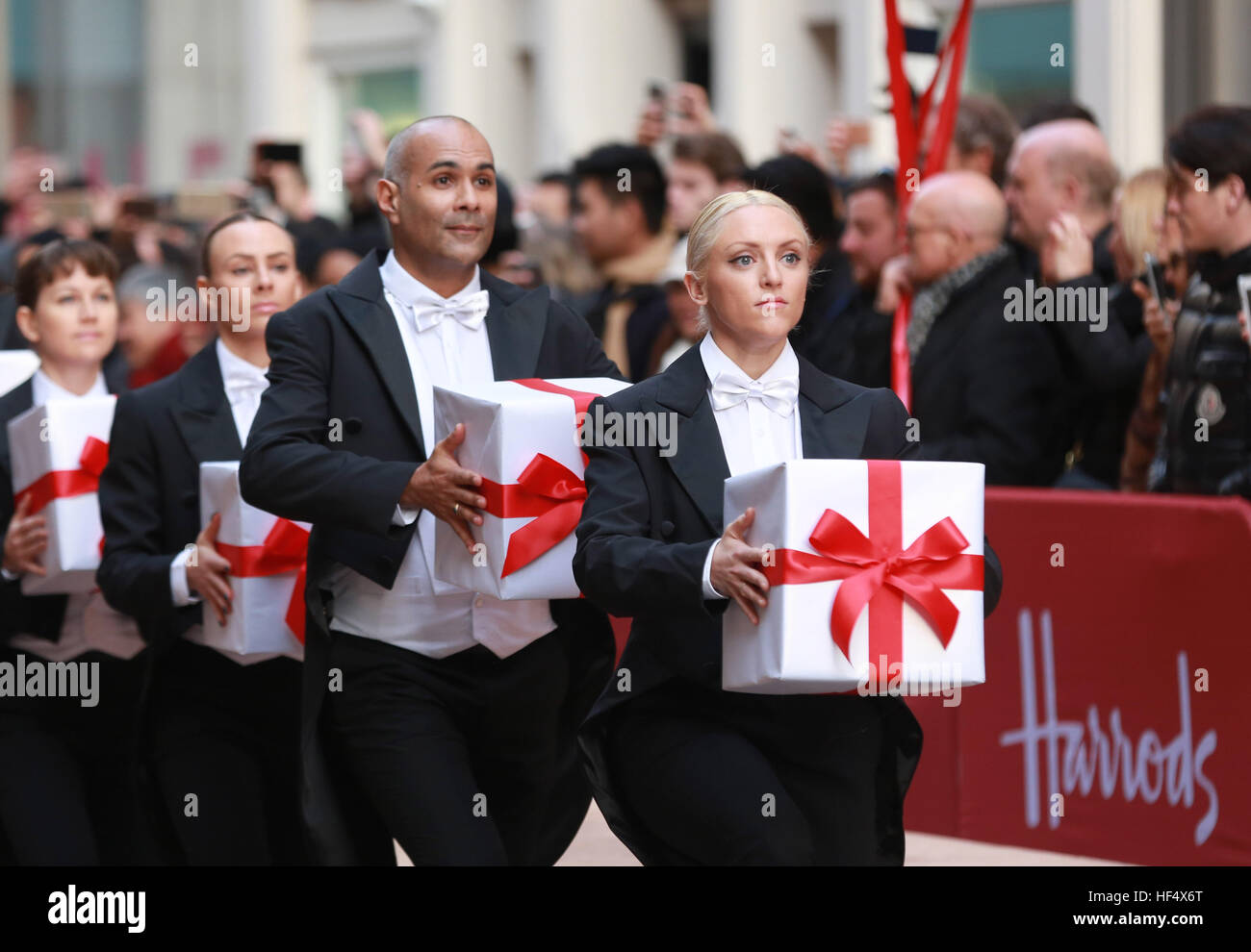 EDITORIAL USE ONLY Harrods butlers serve up a surprise at the opening ...