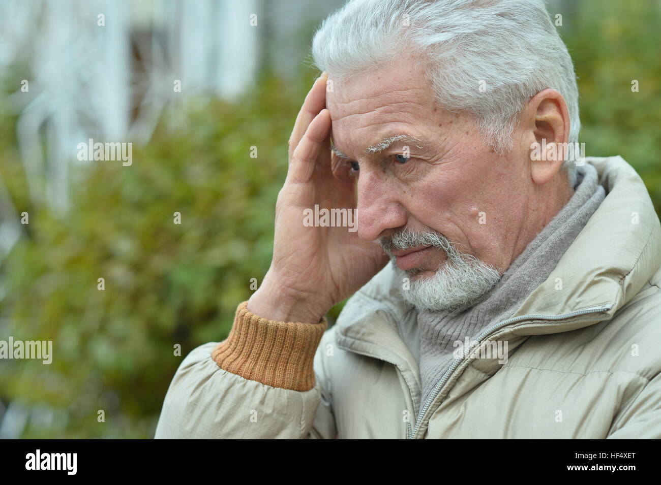 Senior man thinking Stock Photo - Alamy
