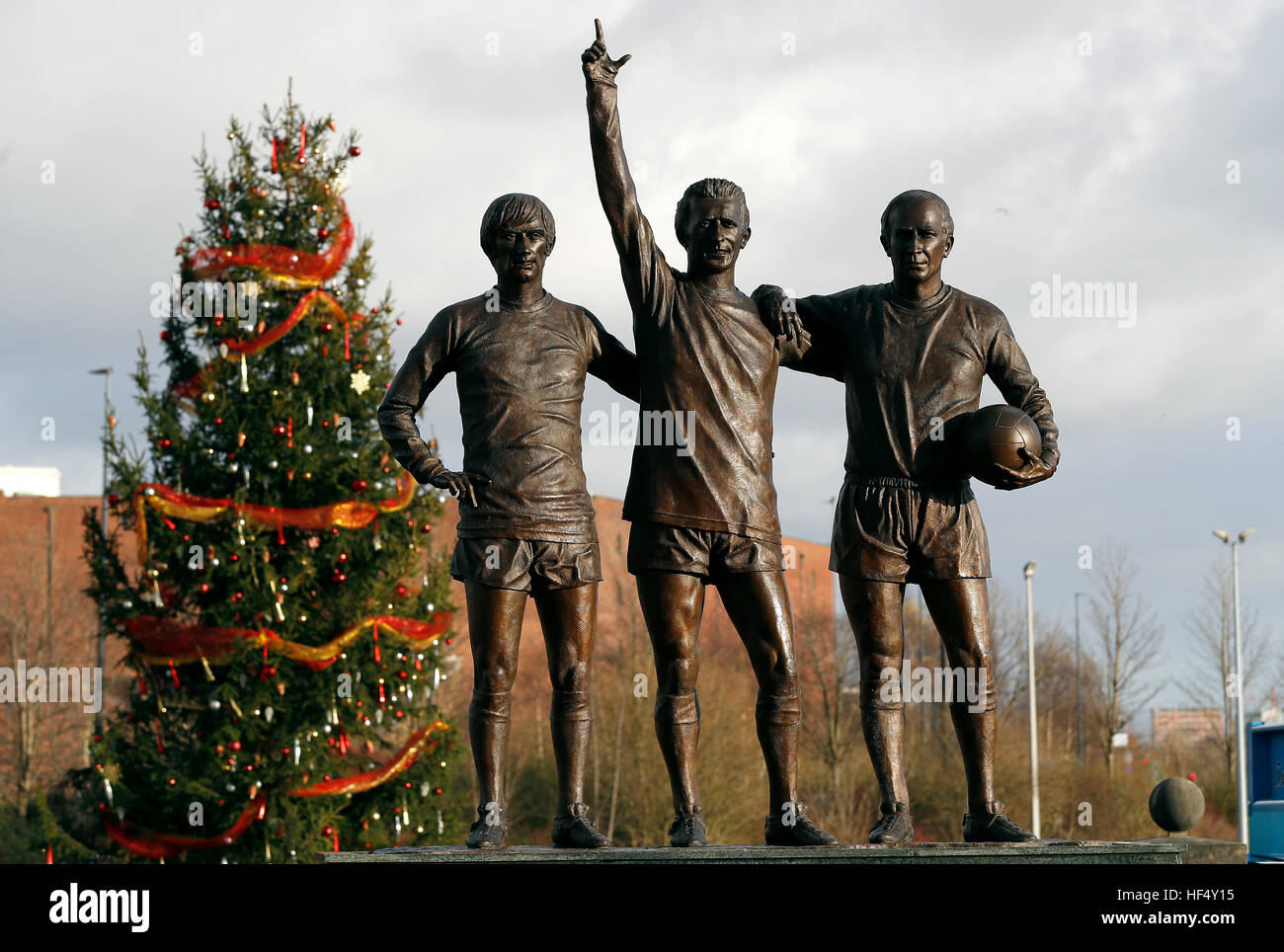 Tribute statues of George Best, Dennis Law and Bobby Charlton, outside ...