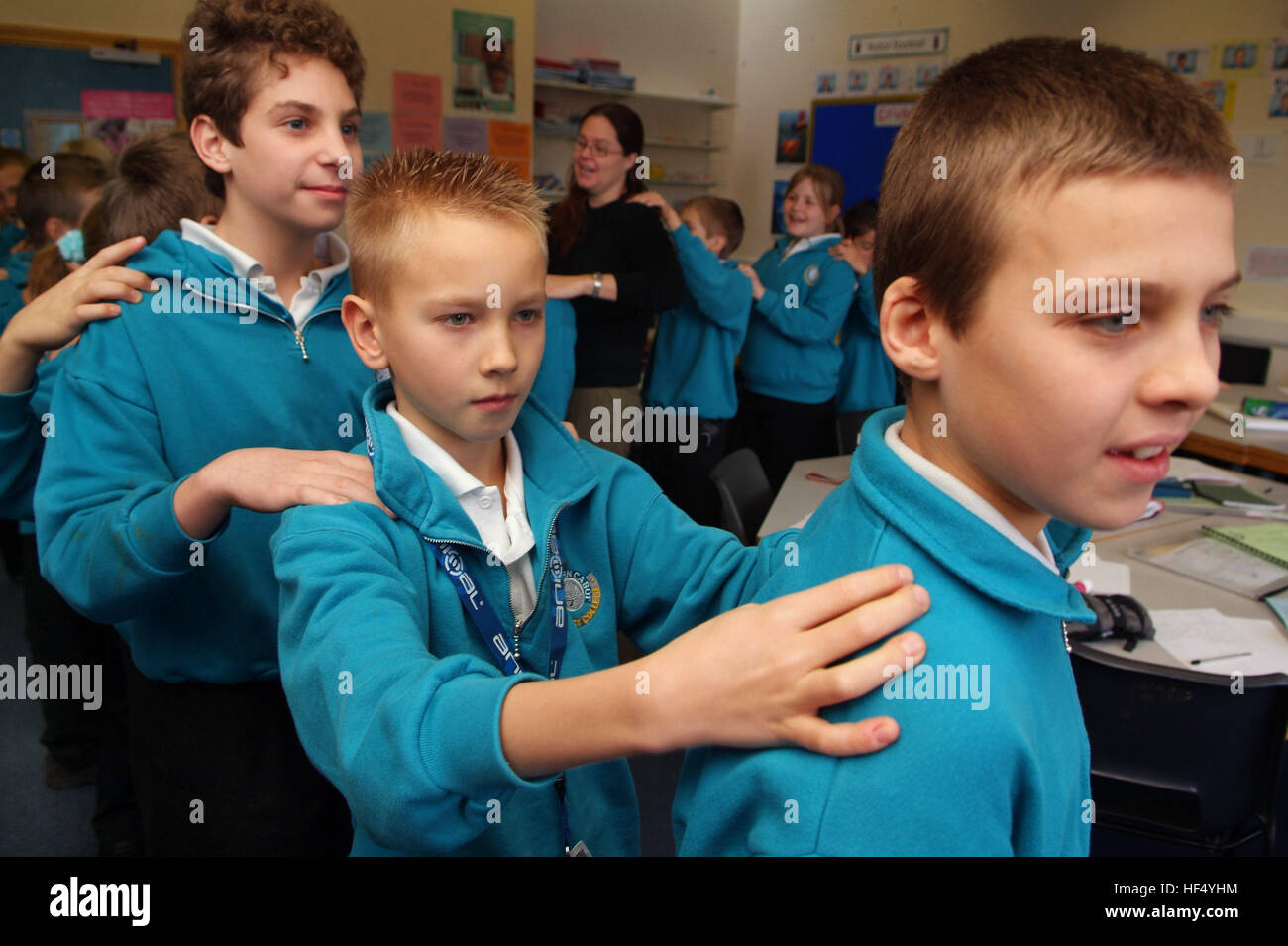 Students in class 7a at John Cabot Academy, Bristol, UK, using massage ...