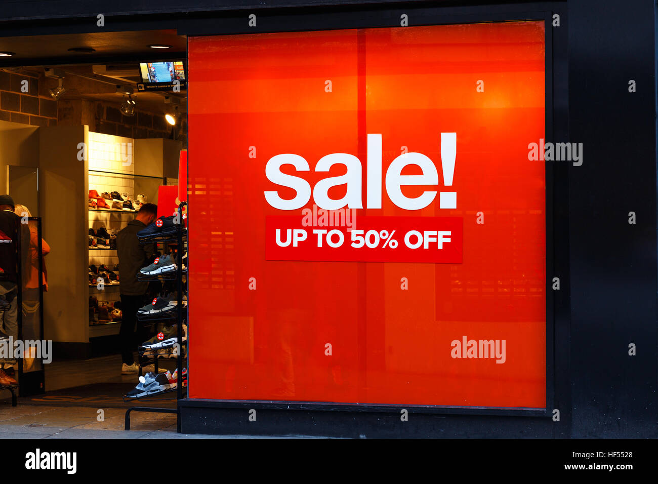 Big red sales poster on Boxing Day at Size? clothing retailer. In ...