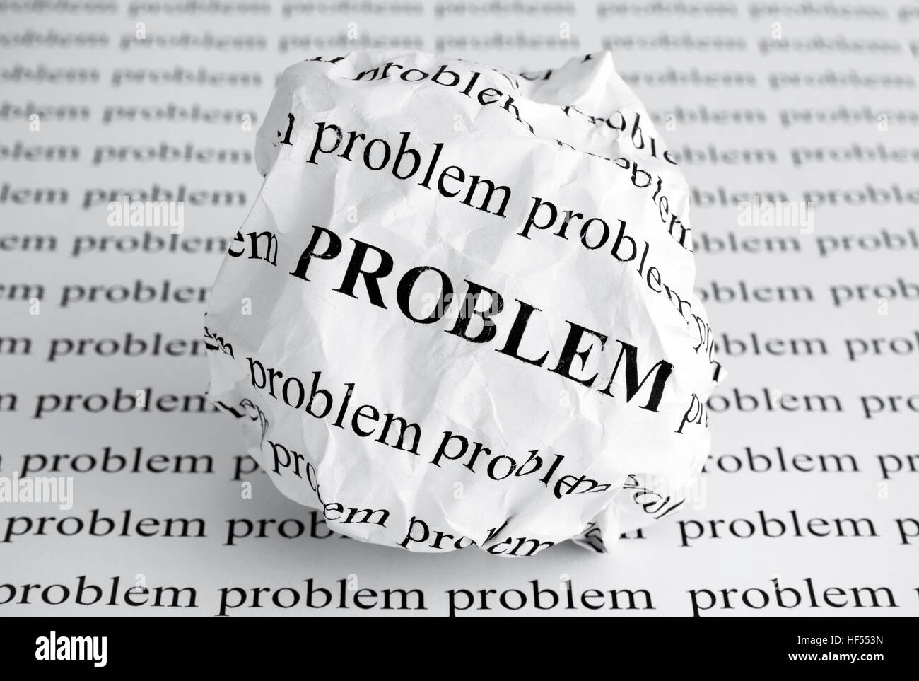 Crumpled paper ball with words Problem on paper background. Black and ...