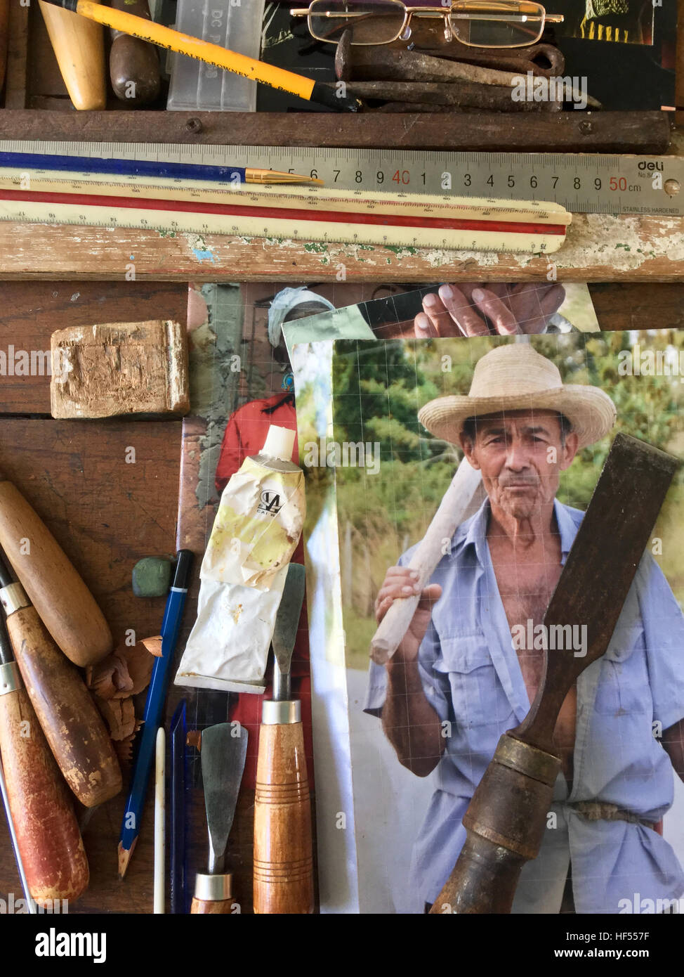 The working table for the wood carvings of artist Lazaro Niebla on old ...