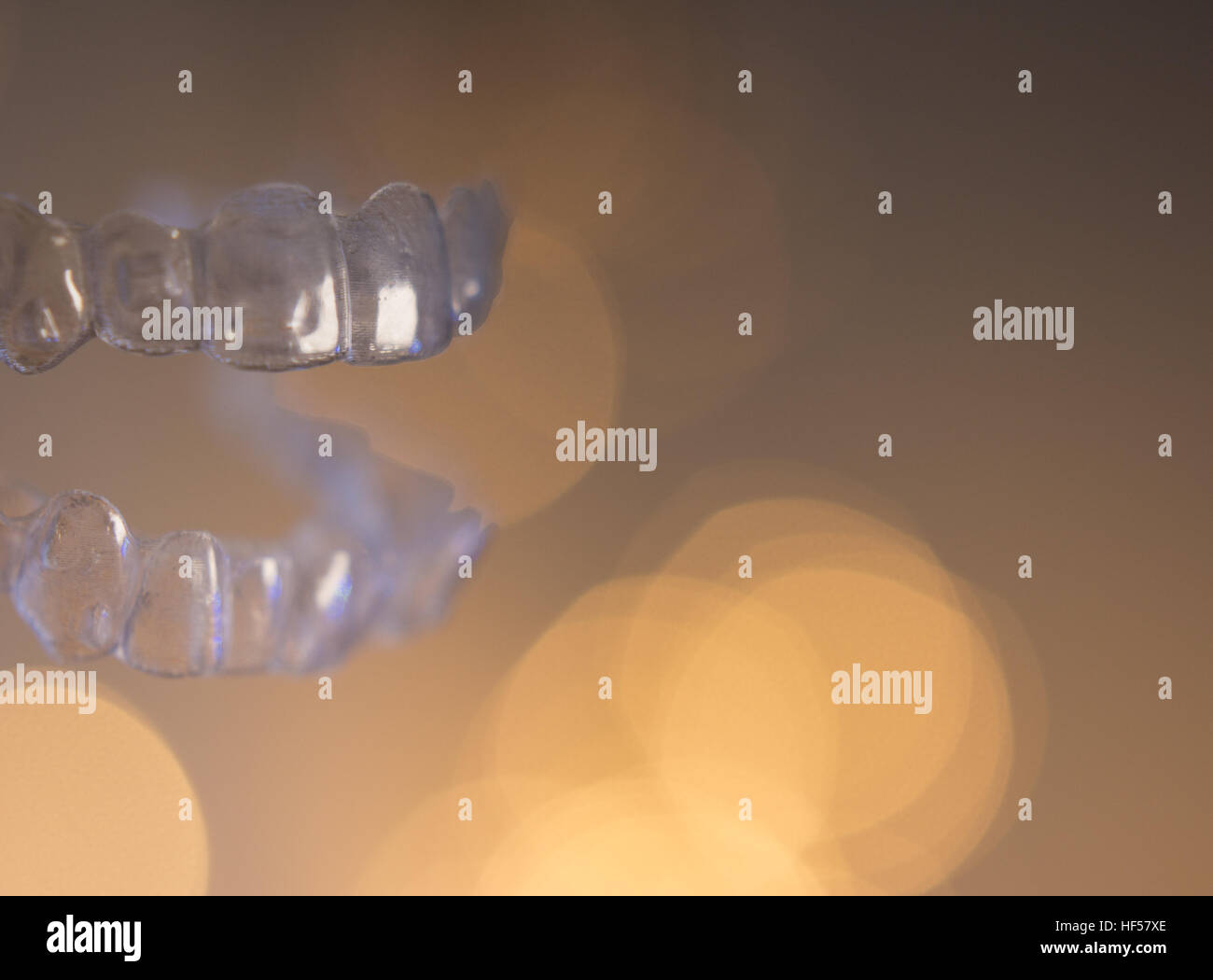 Transparent dental orthodontics for adults and children Stock Photo - Alamy