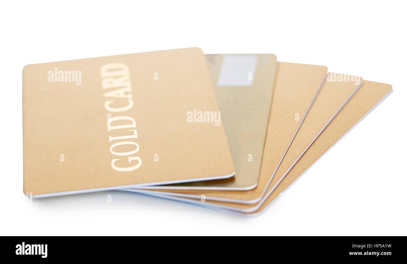 Stack of gold credit card isolated on white background Stock Photo - Alamy