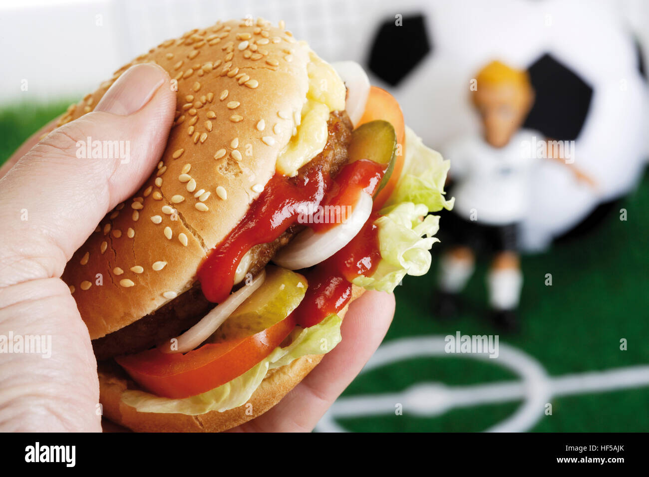 Football player rolls up hi-res stock photography and images - Alamy