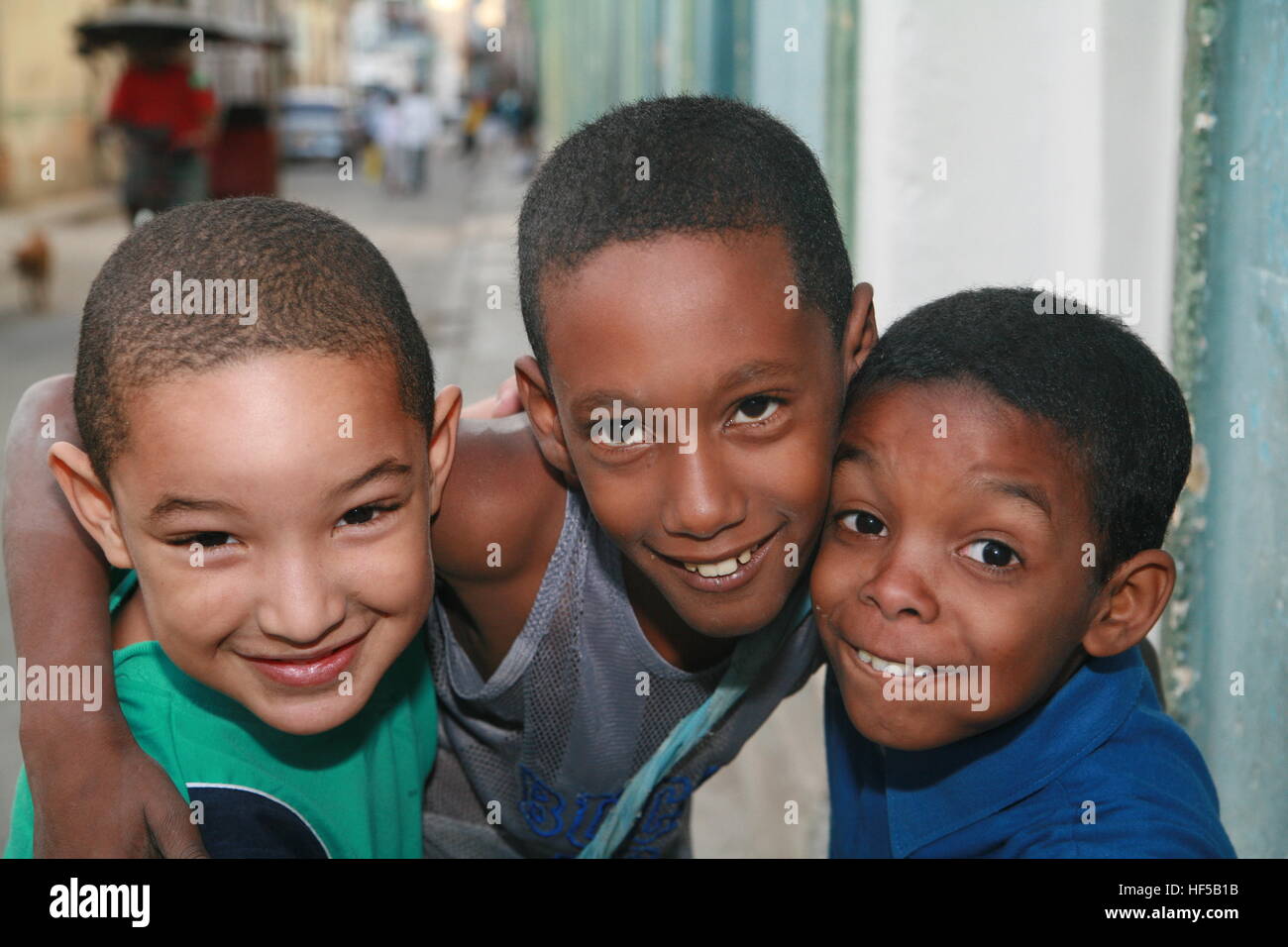 Three boys posing on the street in Havana, Cuba, Caribbean, Americas ...