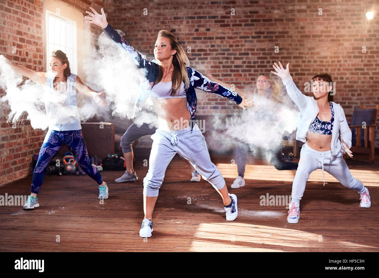 Young hip hop dancers with powder dancing in studio Stock Photo - Alamy
