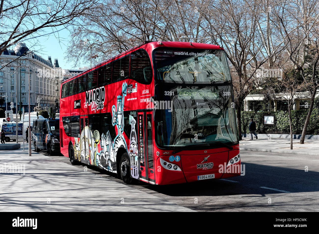 Bright red tourist bus by the Prado Museum in Madrid Stock Photo - Alamy