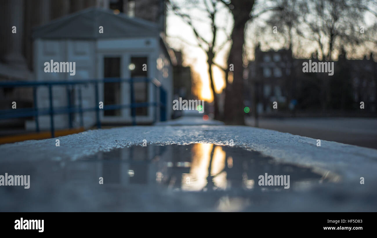 Reflection in puddle of water Stock Photo - Alamy