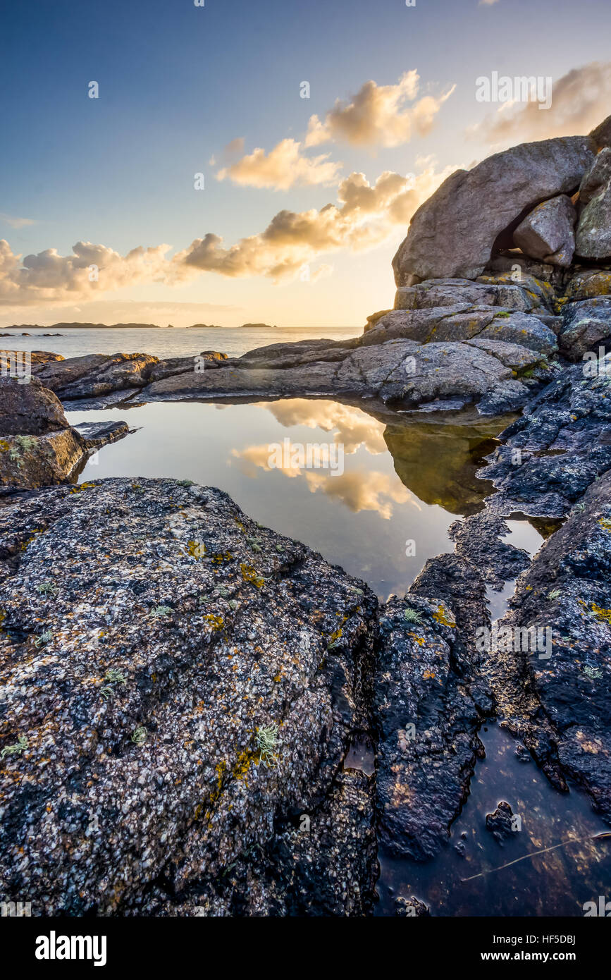 Rock reflecting on the water hi-res stock photography and images - Alamy