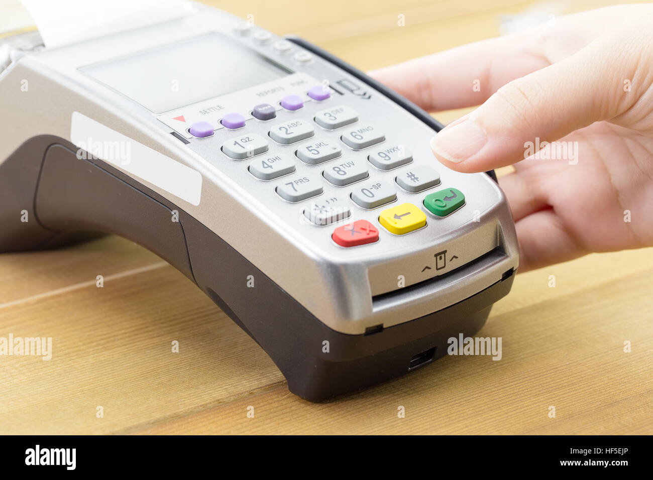 Cashier made a payment in store via EDC or credit card terminal Stock ...