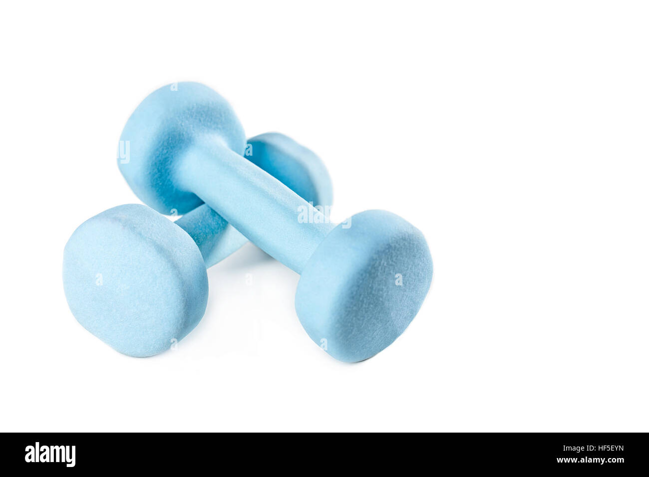 Two blue dumbbells isolated on white background Stock Photo - Alamy
