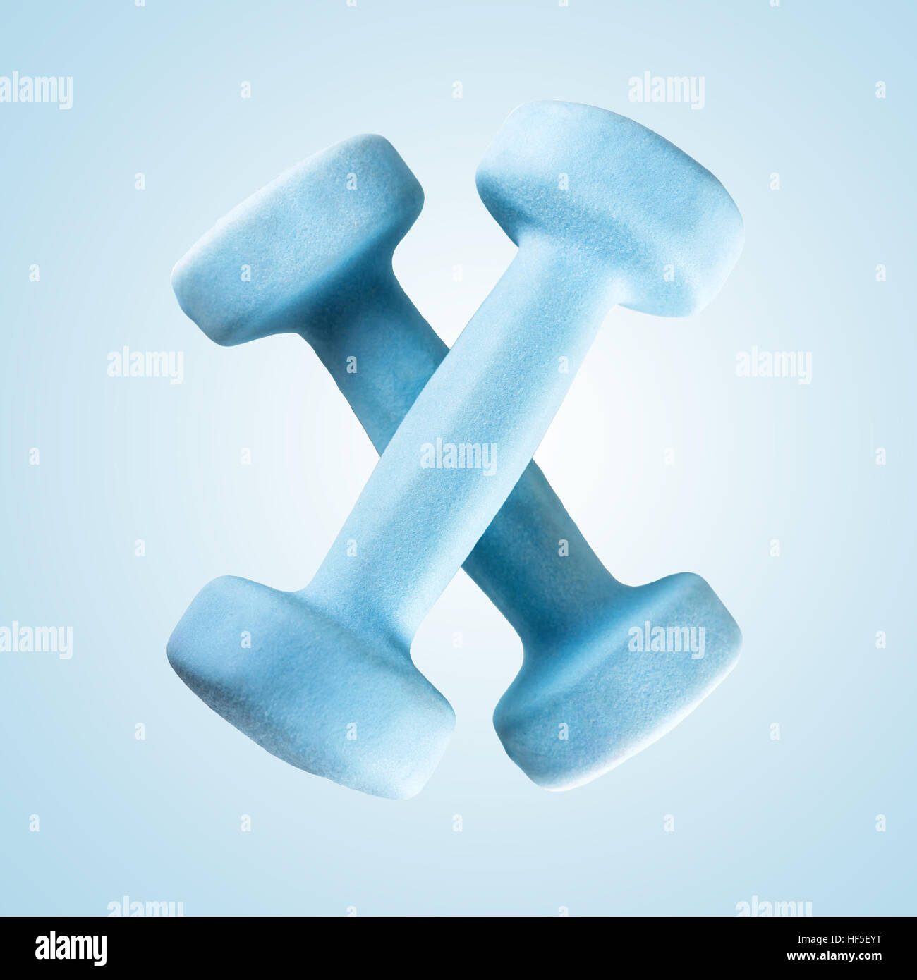 Two blue dumbbells isolated on white background Stock Photo - Alamy
