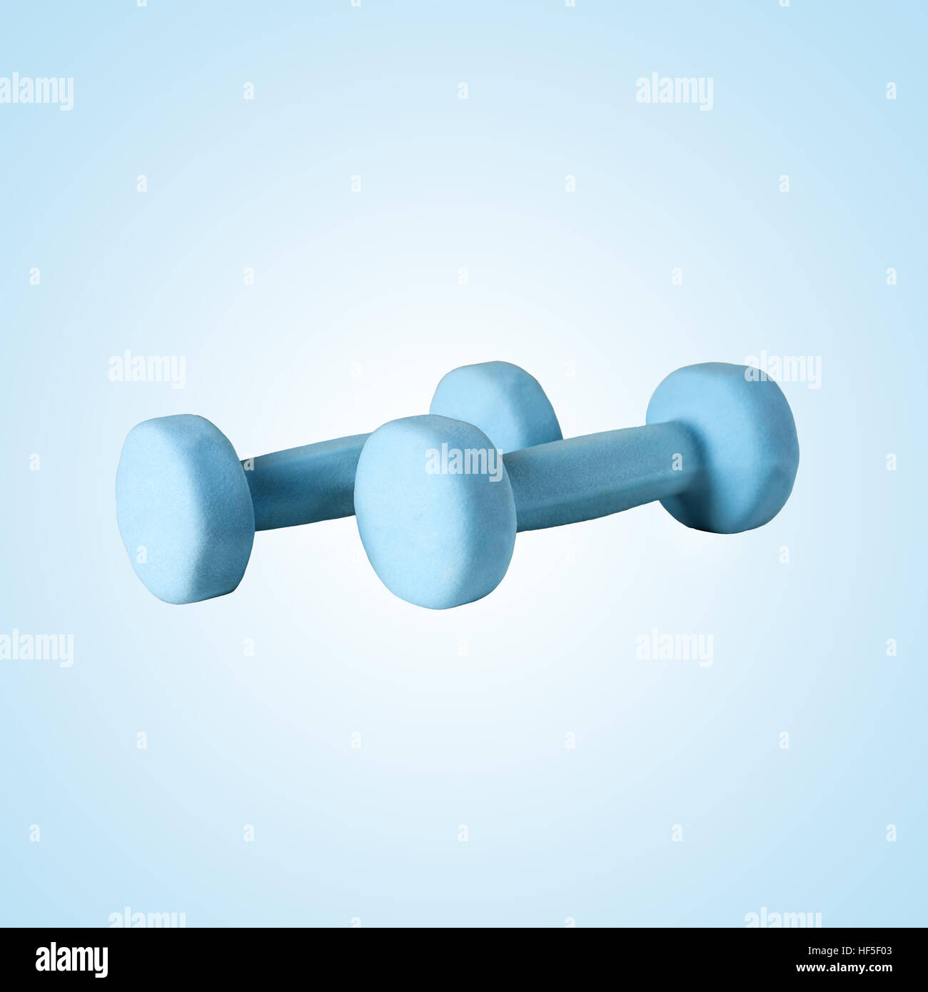 Two blue dumbbells on gradient background Stock Photo - Alamy