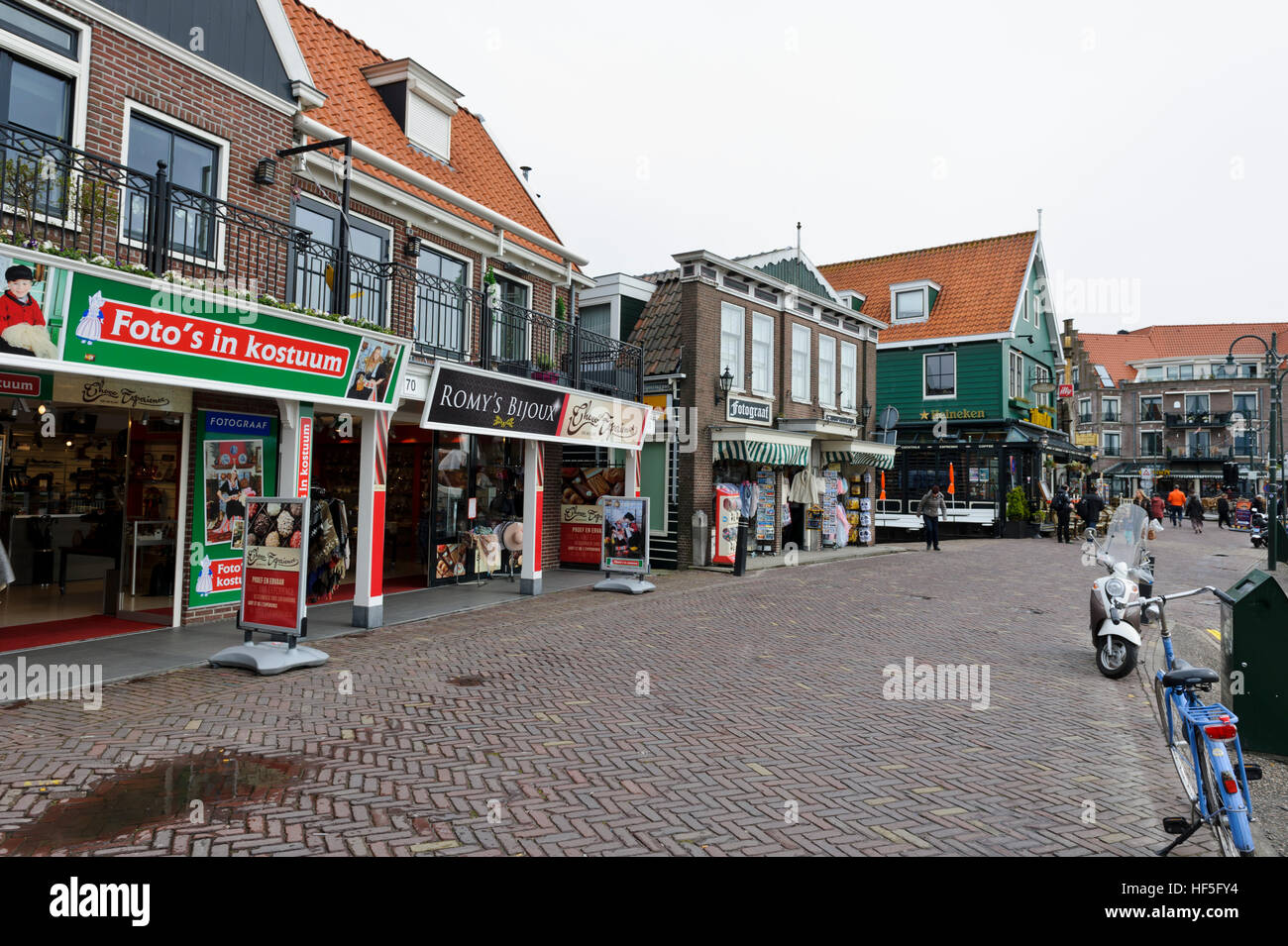 The main street leading to the harbour in the fishing village of ...