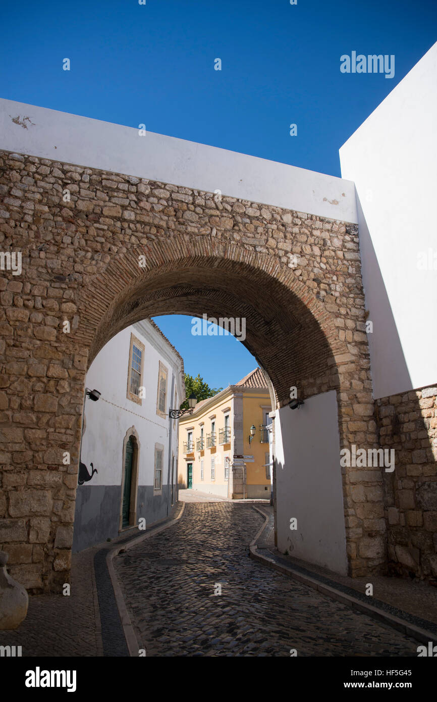 the arco da Repouso Gate in the old town of Faro at the east Algarve in ...