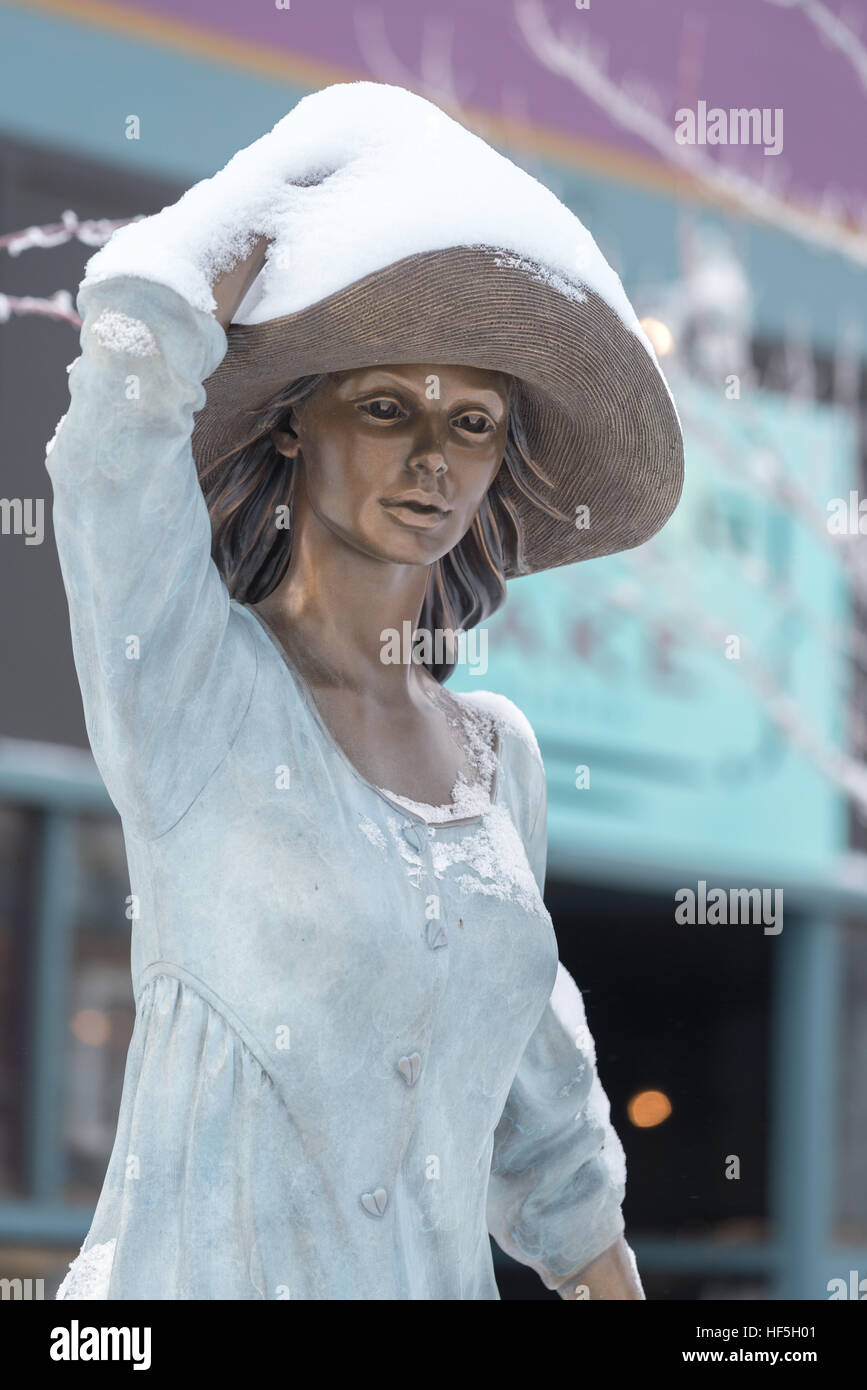 "The Garden Walk" bronze sculpture, by Ramon Parmenter, on a winter day ...