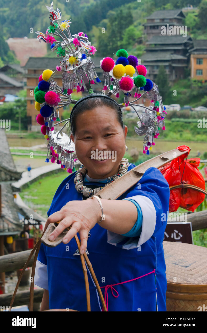 Dong woman carrying food baskets preparing for Long Table Banquet Lunar ...