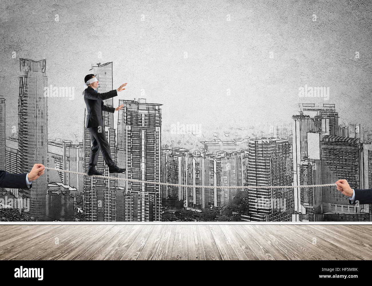 Business concept of risk support and assistance with man balancing on ...