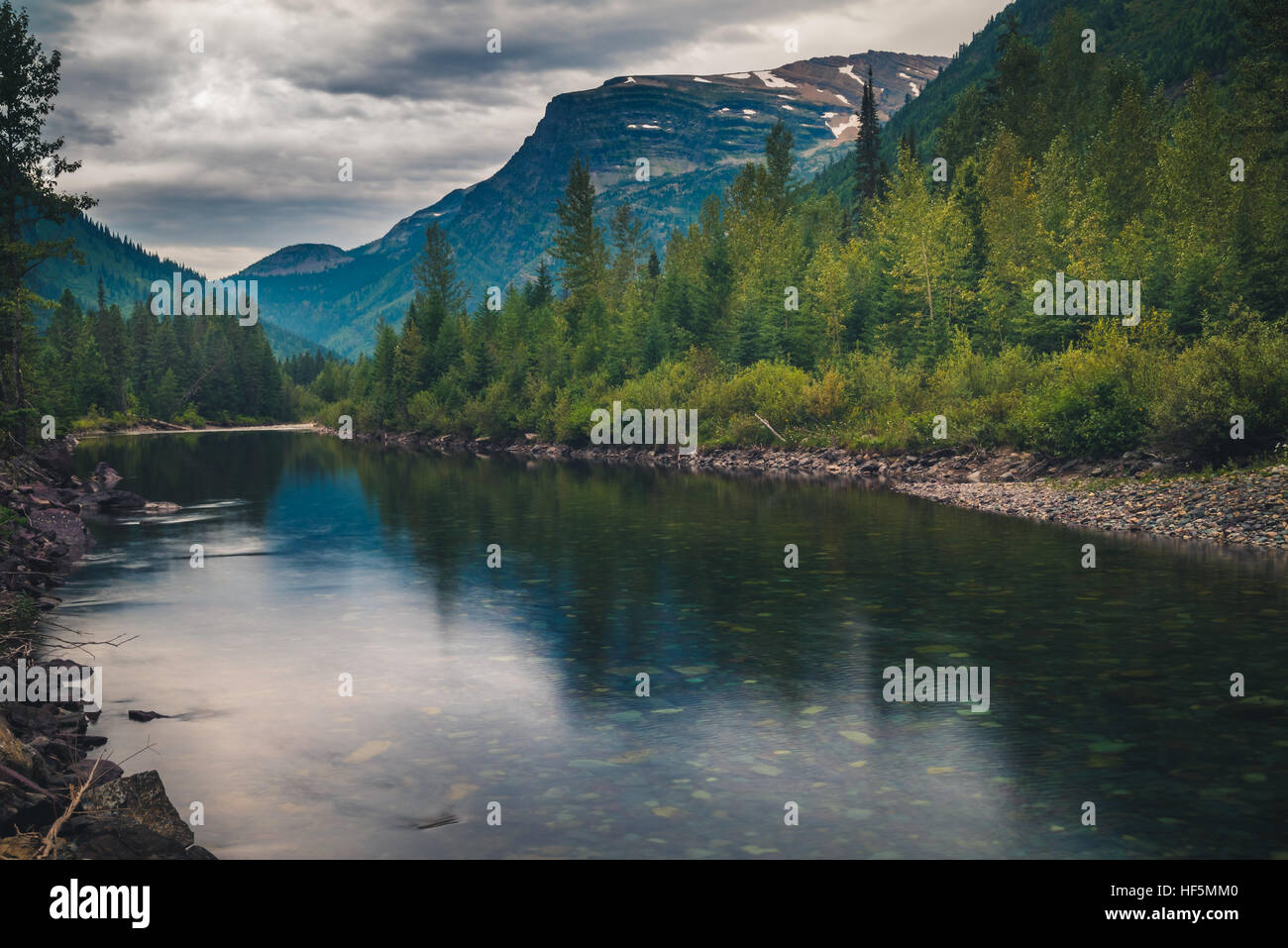 Calm flowing river Stock Photo - Alamy