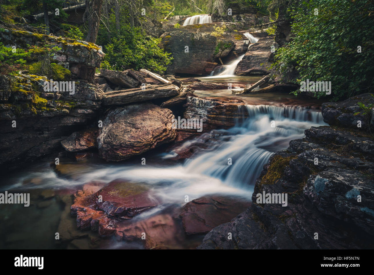 A river flowing over rocks and boulders Stock Photo - Alamy