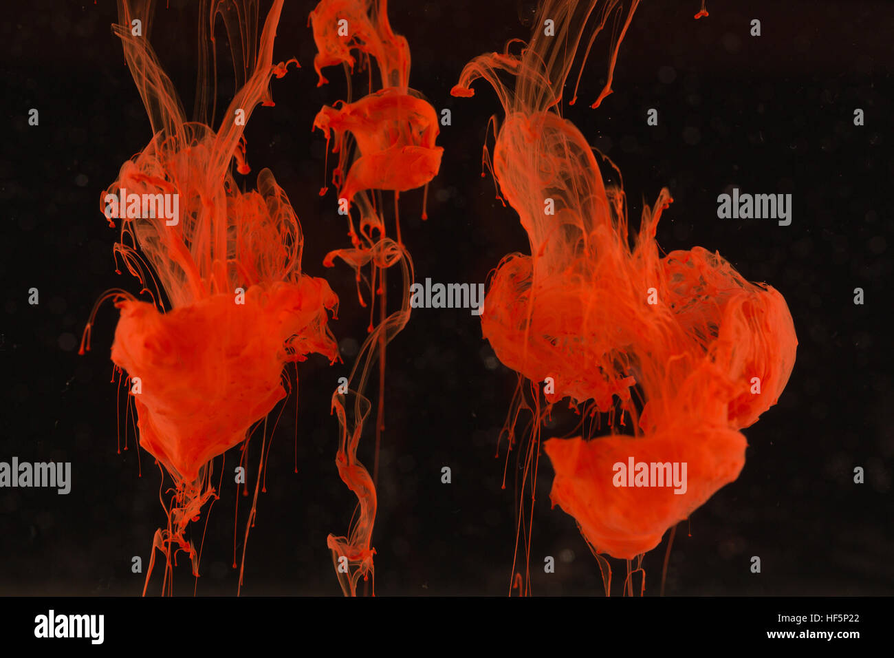 Colorful splashing paint drops in hi-res stock photography and images ...