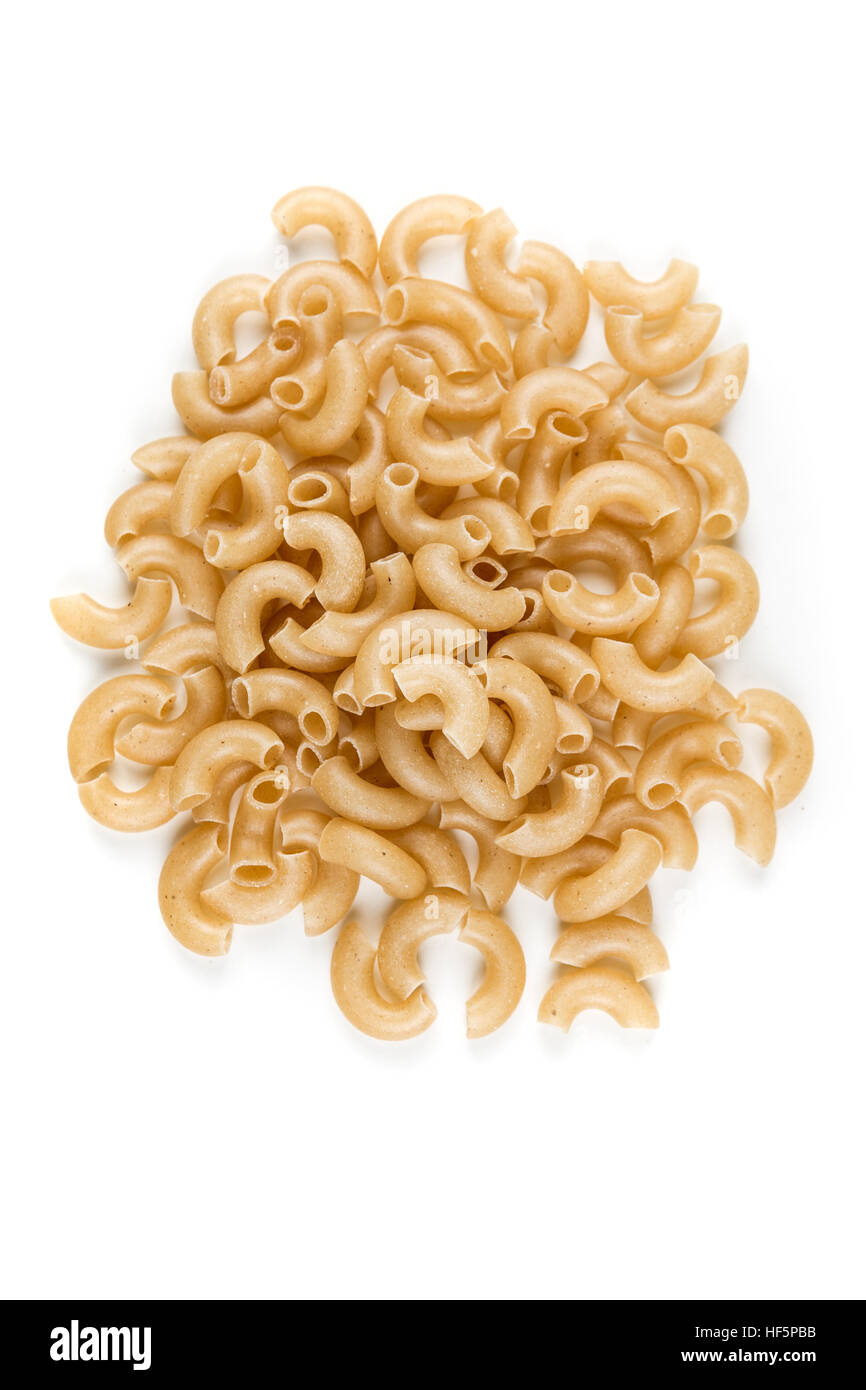 Brown rice elbow macaroni isolated on a white background Stock Photo ...