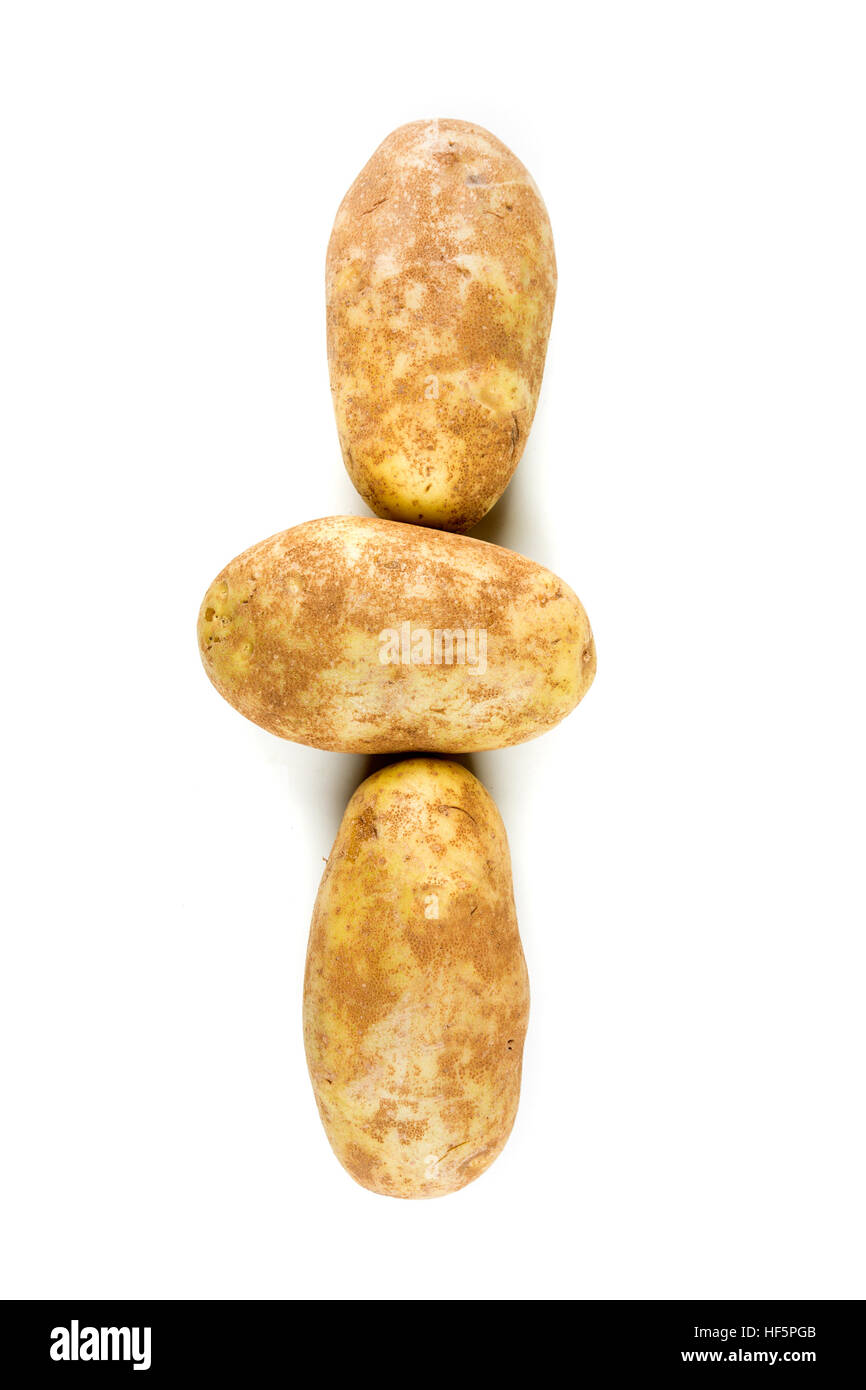 Three potatoes isolated on a white background Stock Photo - Alamy