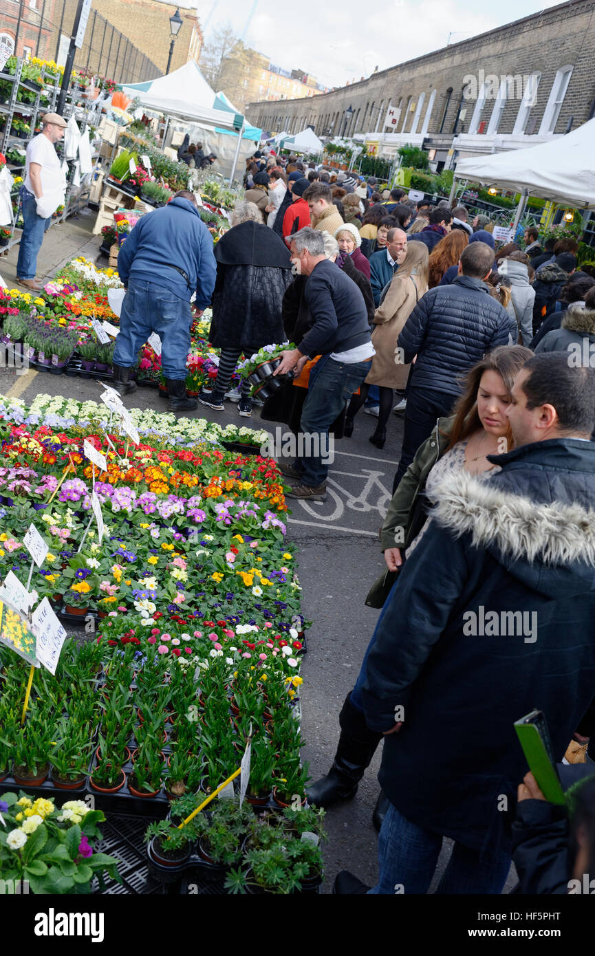 Crowds of people make Colombia Road flower market in East London a very ...